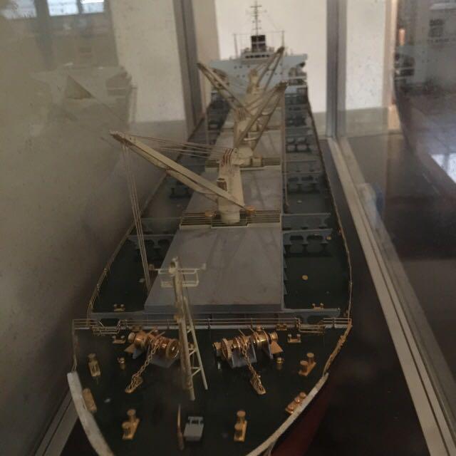 Antique replica of cargo ship vessel within intact glass casing ...