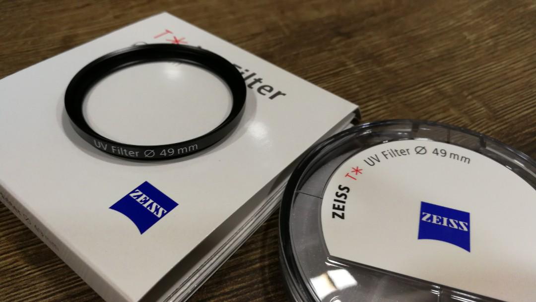 Carl ZEISS T* UV Filter 49mm, Photography, Cameras on Carousell