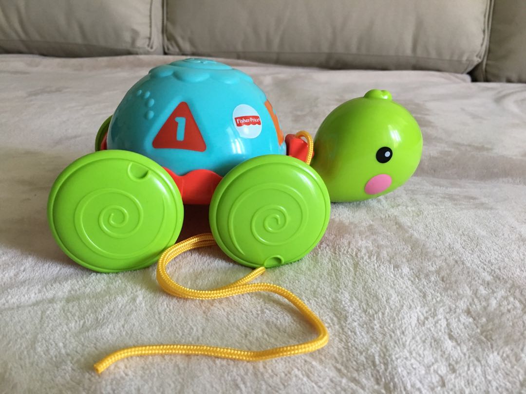 Fisher Price Pull Along Turtle, Babies & Kids, Infant Playtime on Carousell