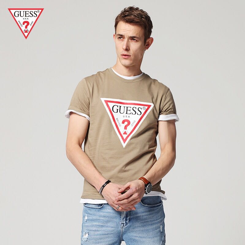 GUESS sticker logo t-shirt, Women's Fashion, Tops, Shirts on Carousell