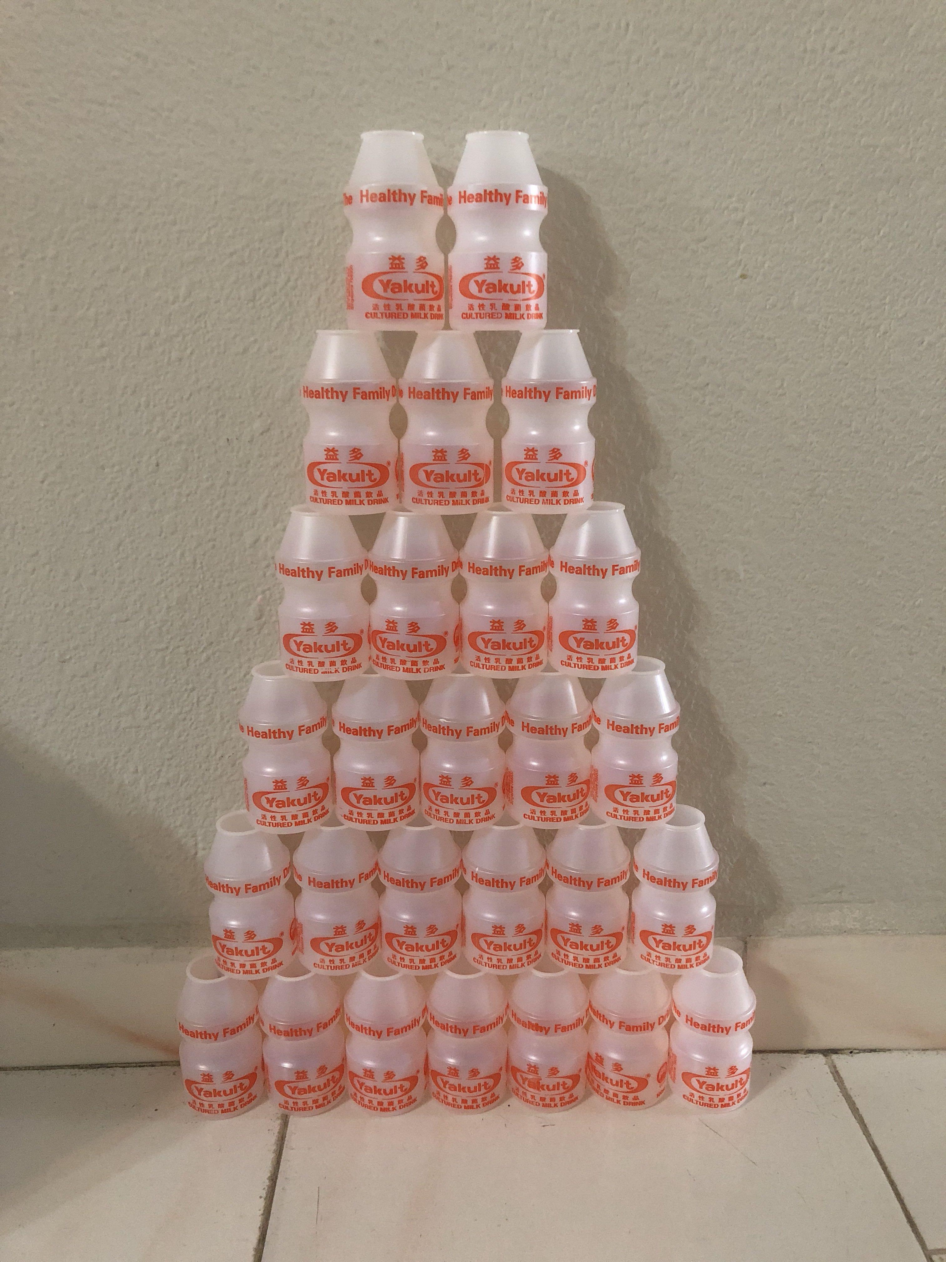 Yakult empty bottles, Furniture & Home Living, Home Improvement ...