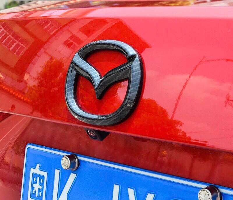 BNIB Mazda Logo Carbon Cover, Car Accessories, Accessories on Carousell