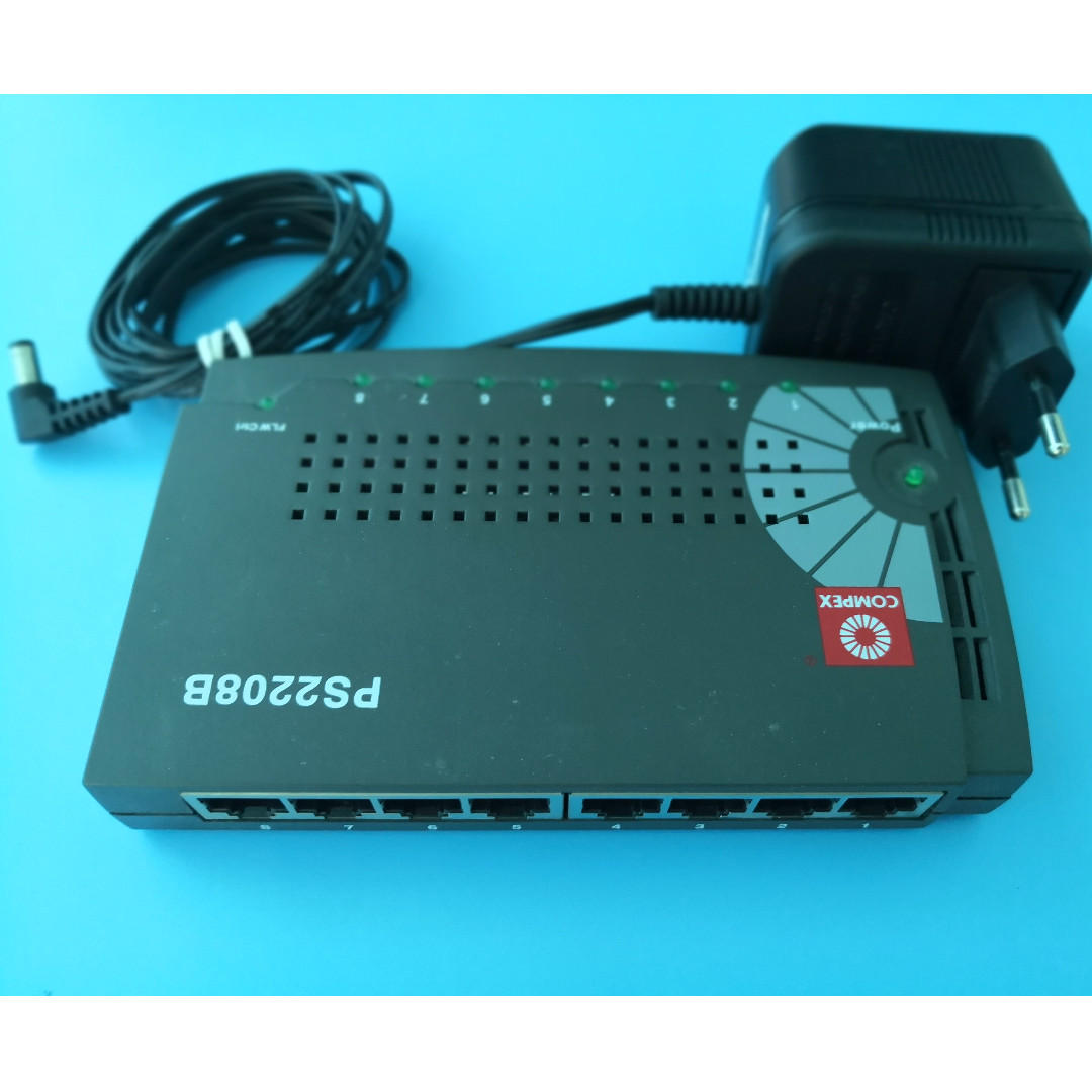 Used 8 ports network switch c/w power adapter in working condition ...