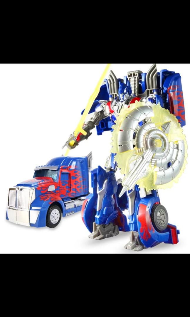 Transformer Optimus Prime convertible car and figurine, Hobbies & Toys ...