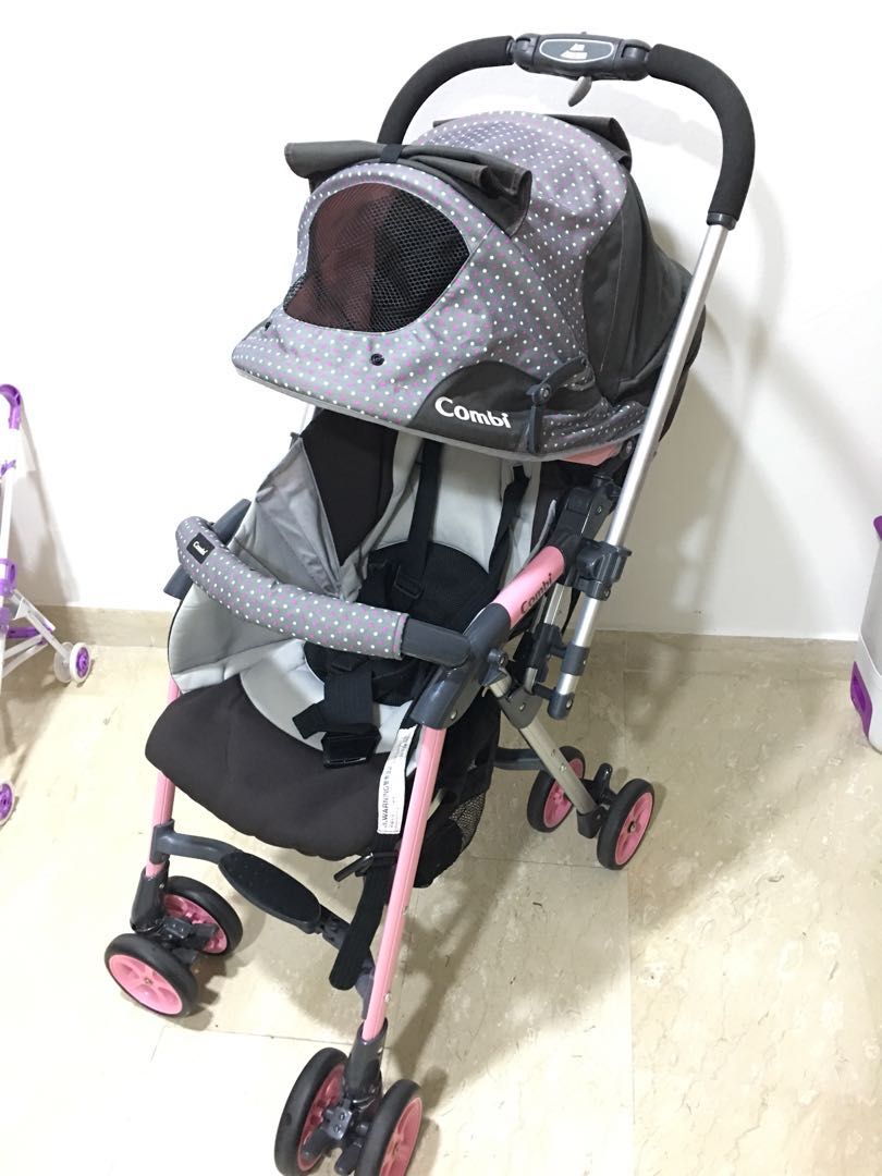 Combi Pink Stroller, Babies & Kids, Going Out, Strollers on Carousell