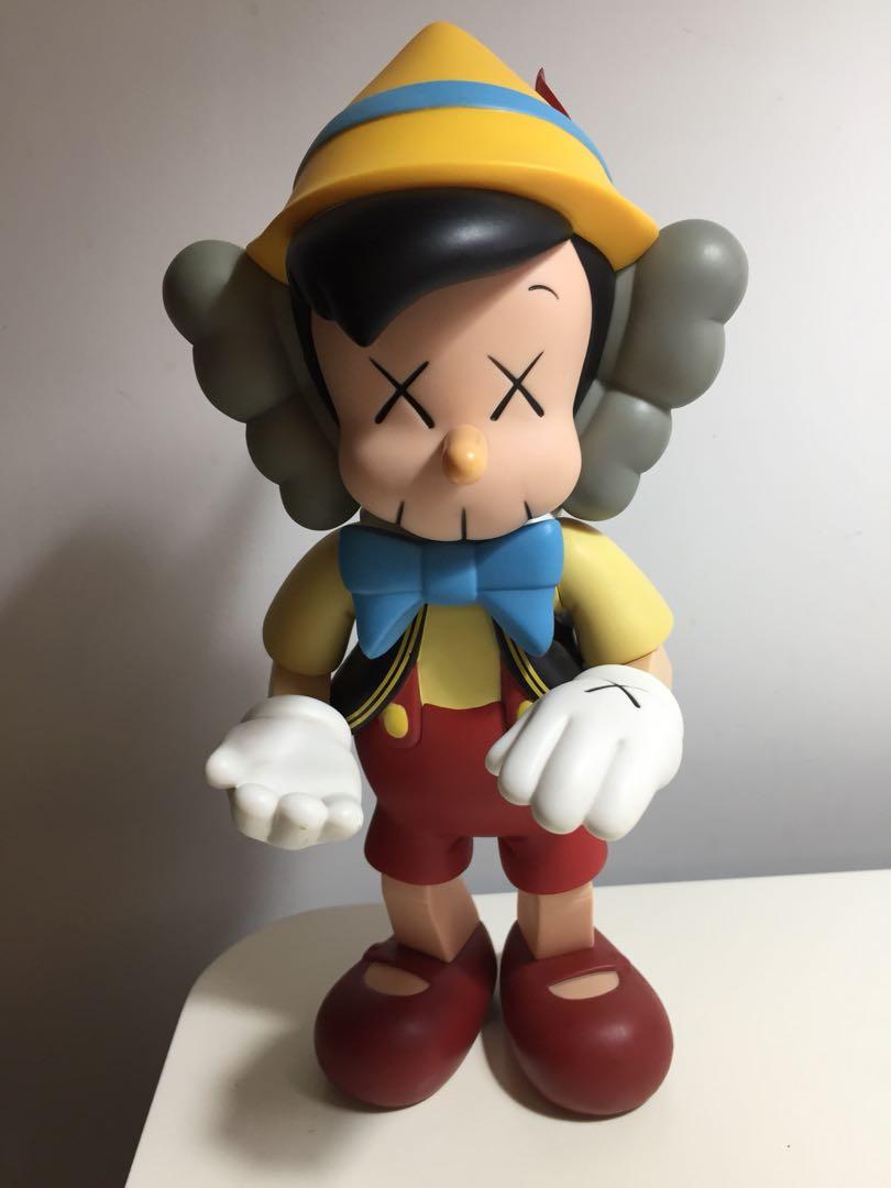 KAWS Pinocchio and Jiminy Cricket, 興趣及遊戲, 玩具 & 遊戲類 - Carousell
