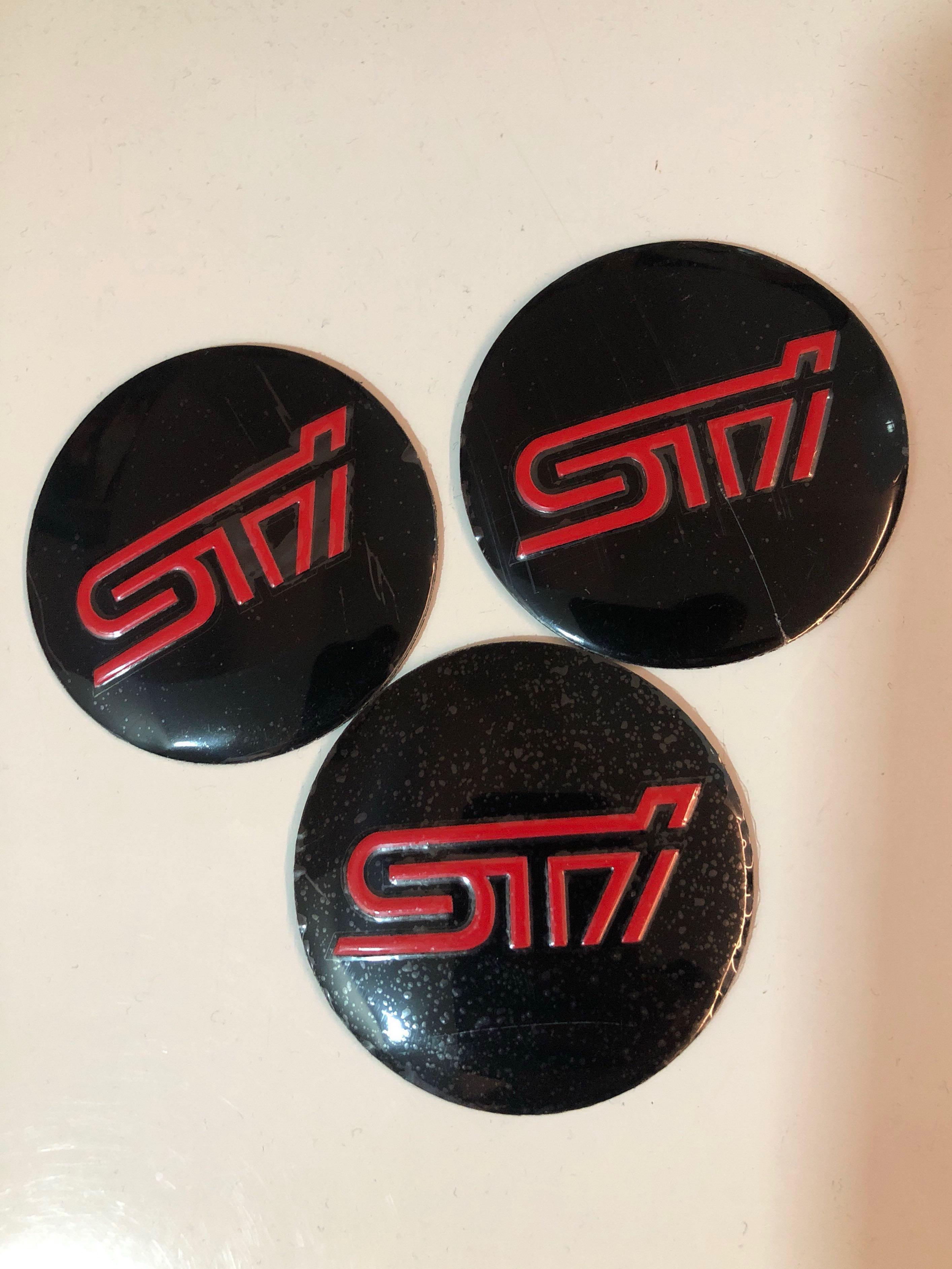 STI wheel cap 3 pieces., Car Accessories, Accessories on Carousell