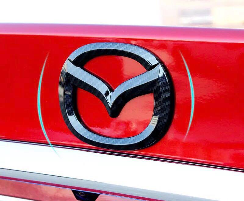 BNIB Mazda Logo Carbon Cover, Car Accessories, Accessories on Carousell