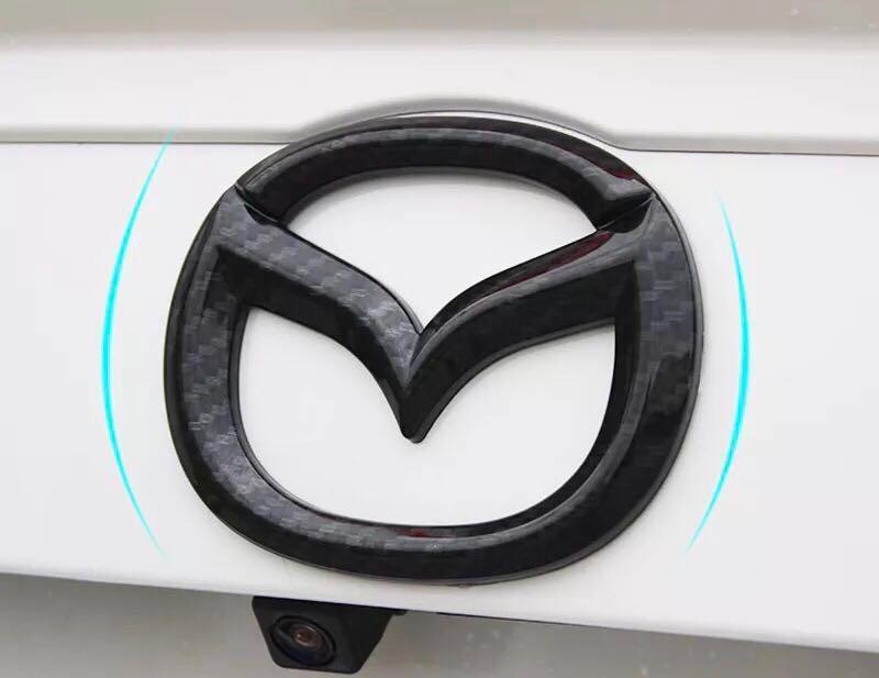 BNIB Mazda Logo Carbon Cover, Car Accessories, Accessories on Carousell