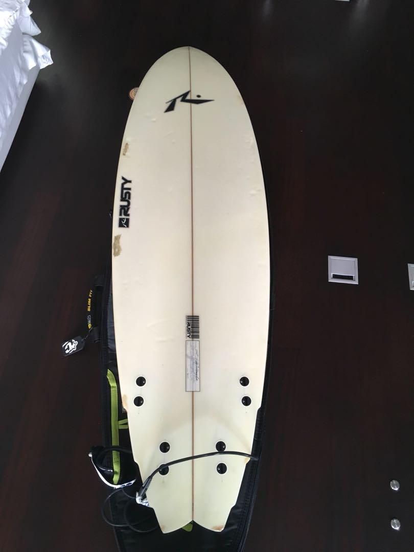 Rusty 6’2 surfboard with creatures surf bag including fins and leach ...