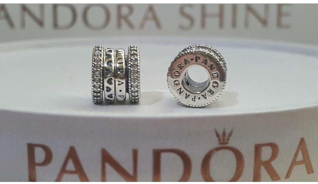 Pandora signature stopper charm, Women's Fashion, Jewelry & Organizers ...