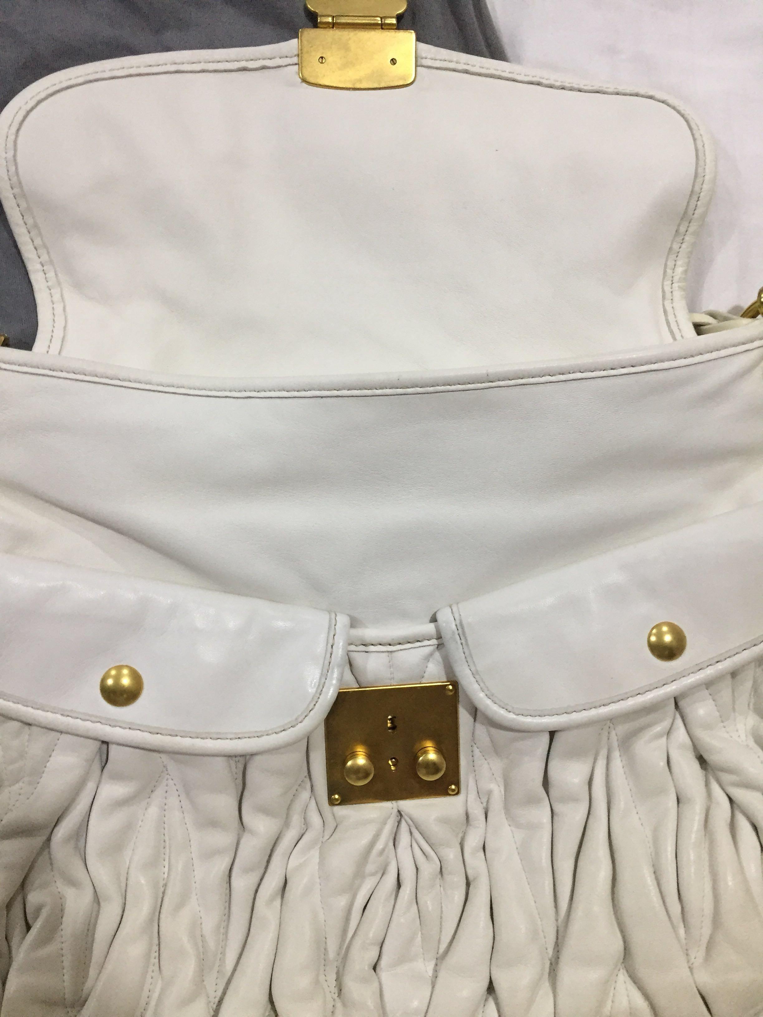 Miu miu matelasse coffer bag, Women's Fashion, Bags & Wallets, Purses ...