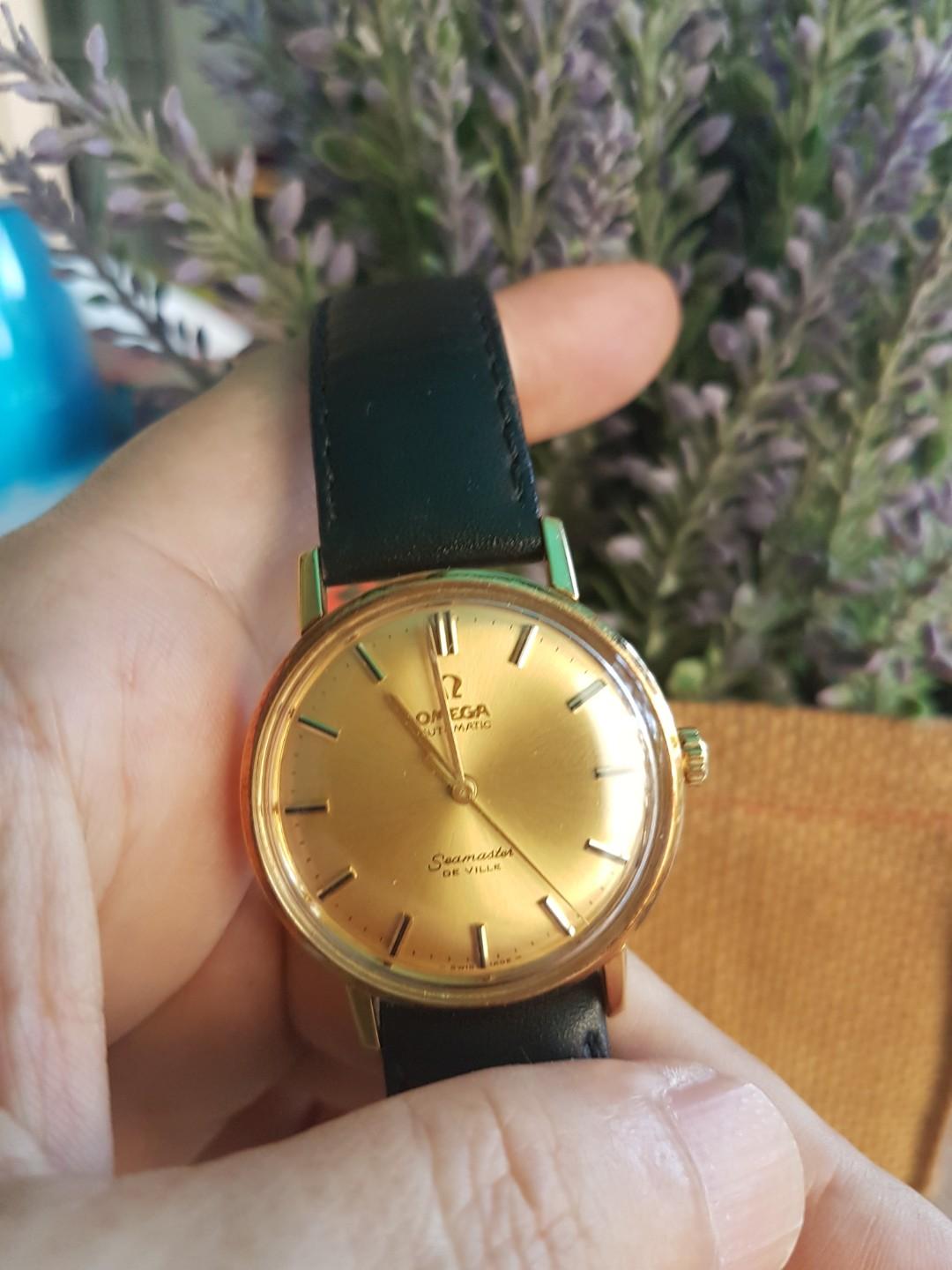 Omega vintage solid gold watch, Luxury, Watches on Carousell