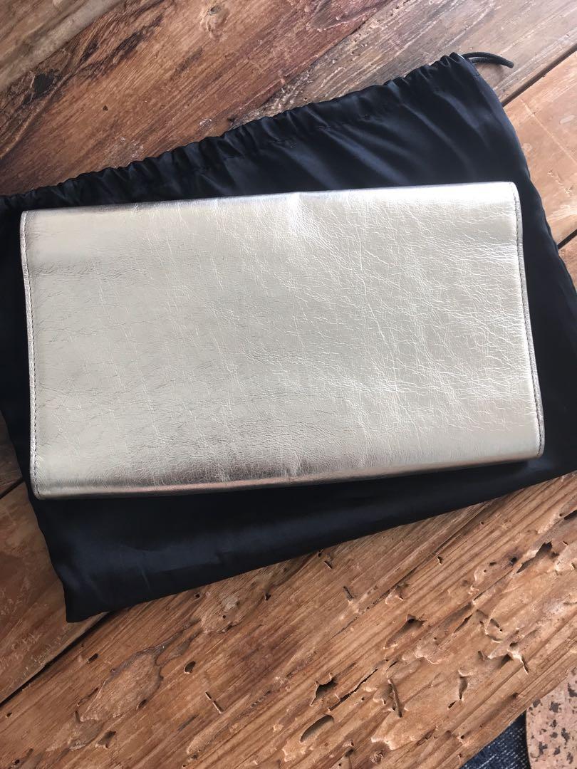 YSL Gold Clutch, Women's Fashion, Bags & Wallets, Clutches on Carousell
