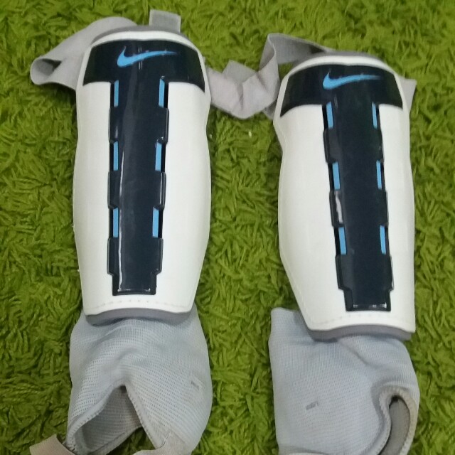 Nike shin pad, Men's Fashion, Activewear on Carousell
