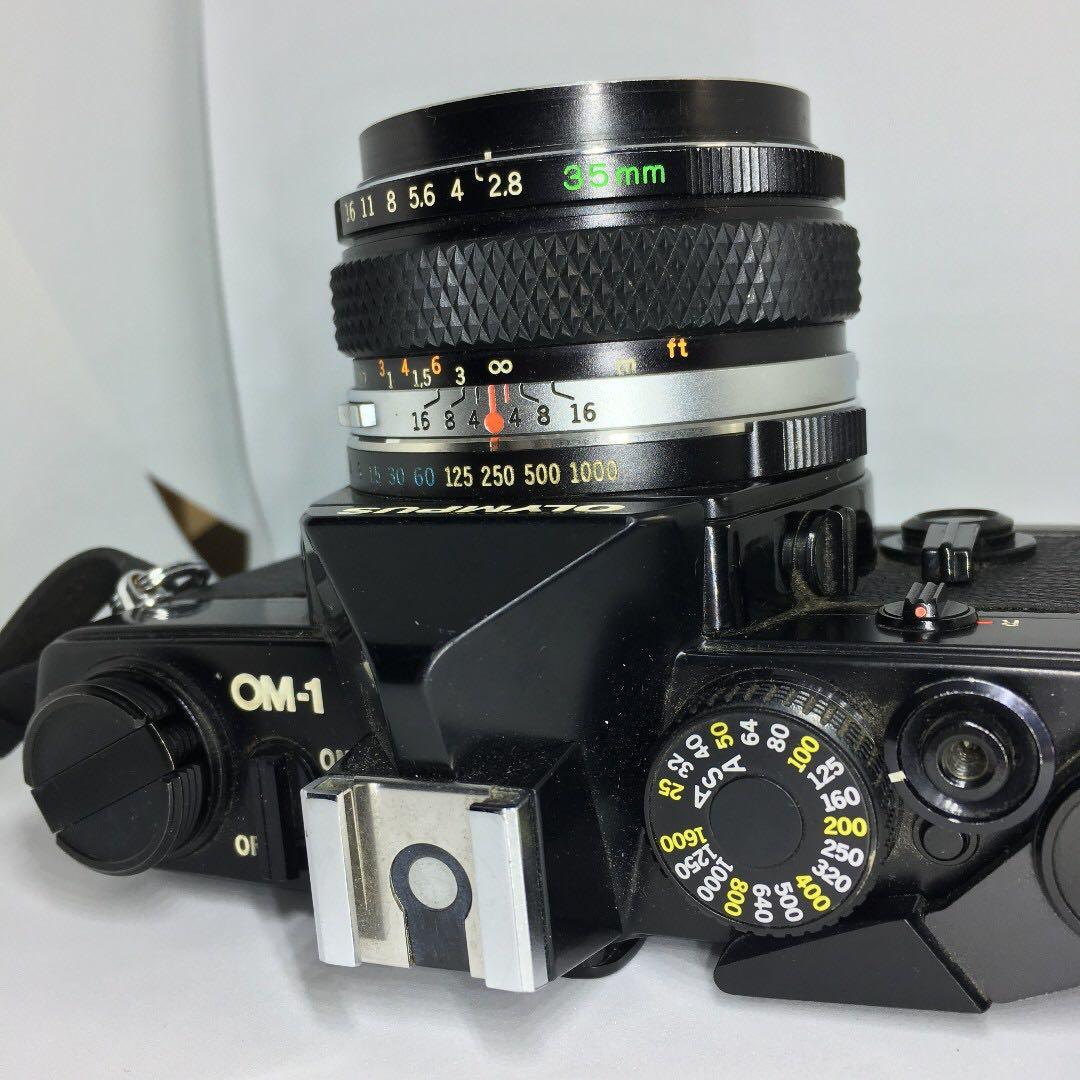 Olympus OM-1 Black Film Camera, Photography, Cameras on Carousell