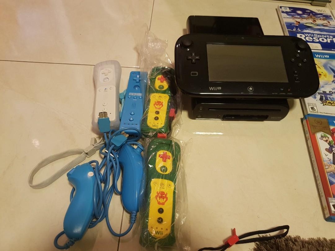 Wii U + 4 controllers + 8 games, Video Gaming, Gaming Accessories, Controllers on Carousell