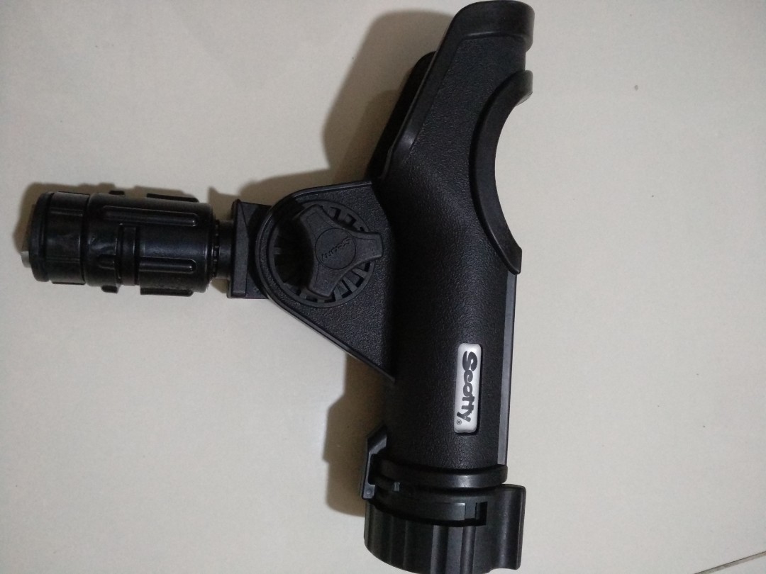 Original scotty . My kayak comes with rod holder. Letting go with track ...