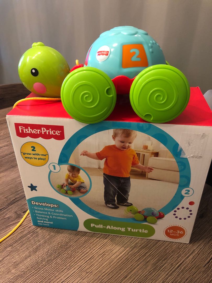 Fisher price pull along turtle, Babies & Kids, Infant Playtime on Carousell