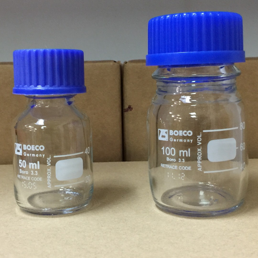 Glass laboratory bottle 100ml, c/w blue screw cap and pouring ring ...