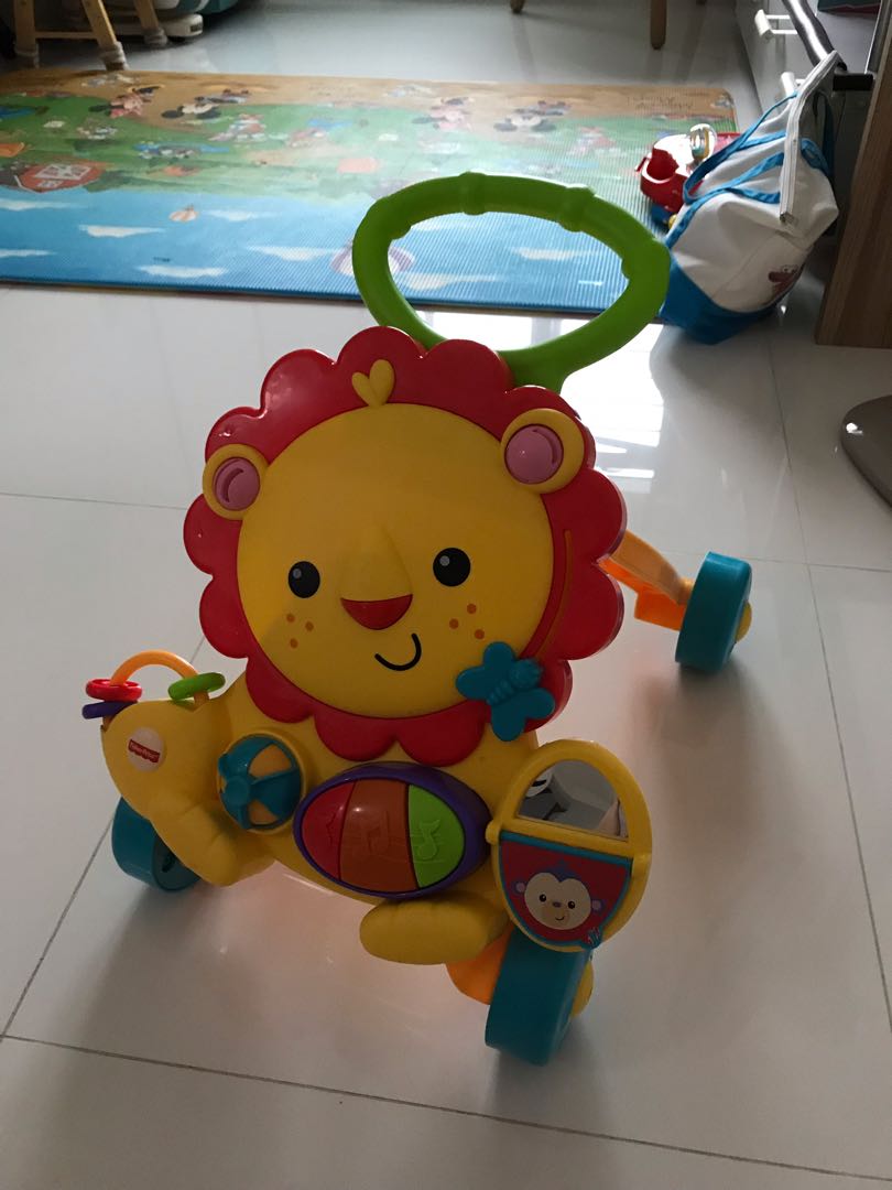 Fisher Price Lion Walker, Babies & Kids, Toys & Walkers on Carousell