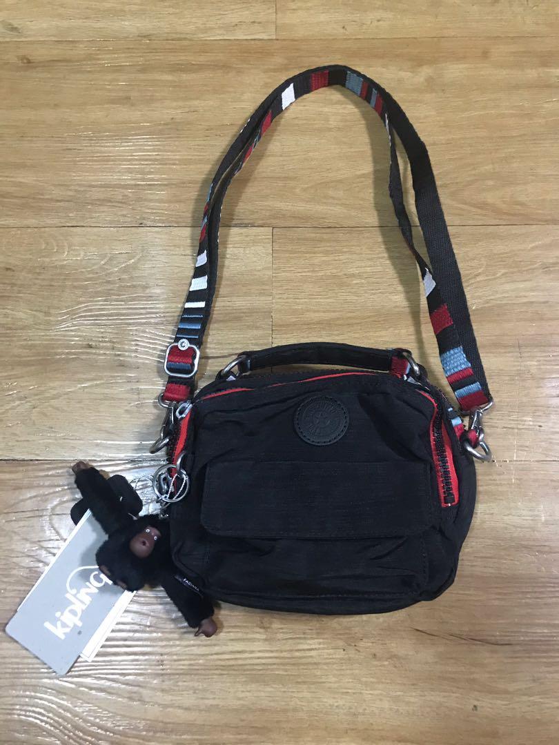 Kipling Puck shell slingbag, Women's Fashion, Bags & Wallets, Cross ...