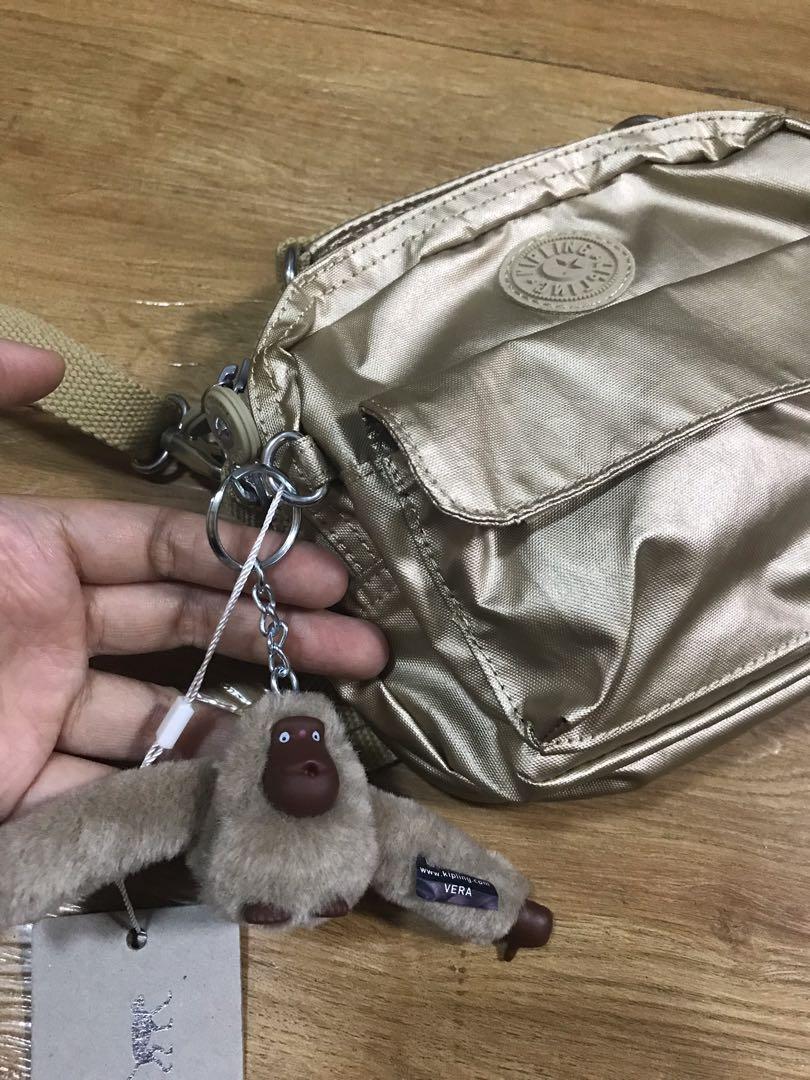 Kipling Puck shell slingbag, Women's Fashion, Bags & Wallets, Cross ...