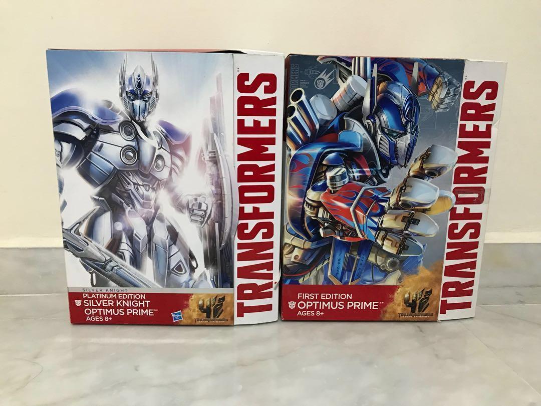 Set of 2: Transformers Movie Silver Knight and First Edition Optimus ...