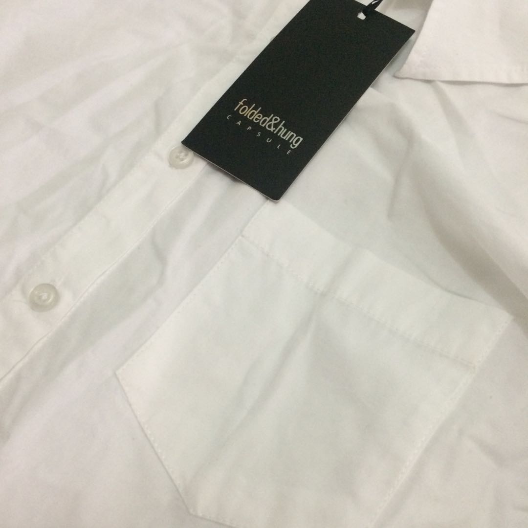 Folded and Hung White Off Shoulder Polo, Women's Fashion, Tops ...