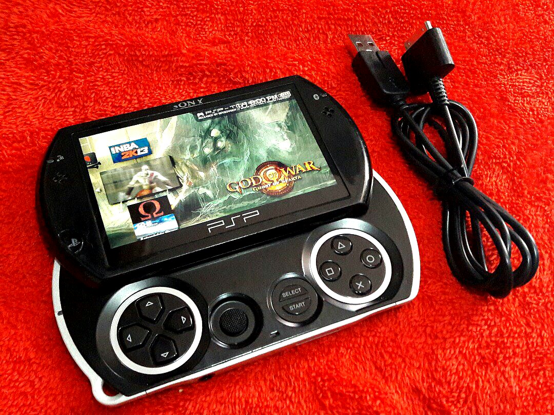 Psp go 16gb v6.20 full of games final fantasy resident evil god of war ...