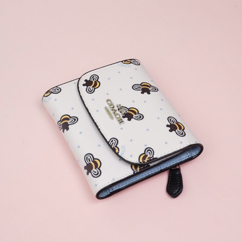 Original coach small wallet with bee print, Luxury, Bags & Wallets on ...