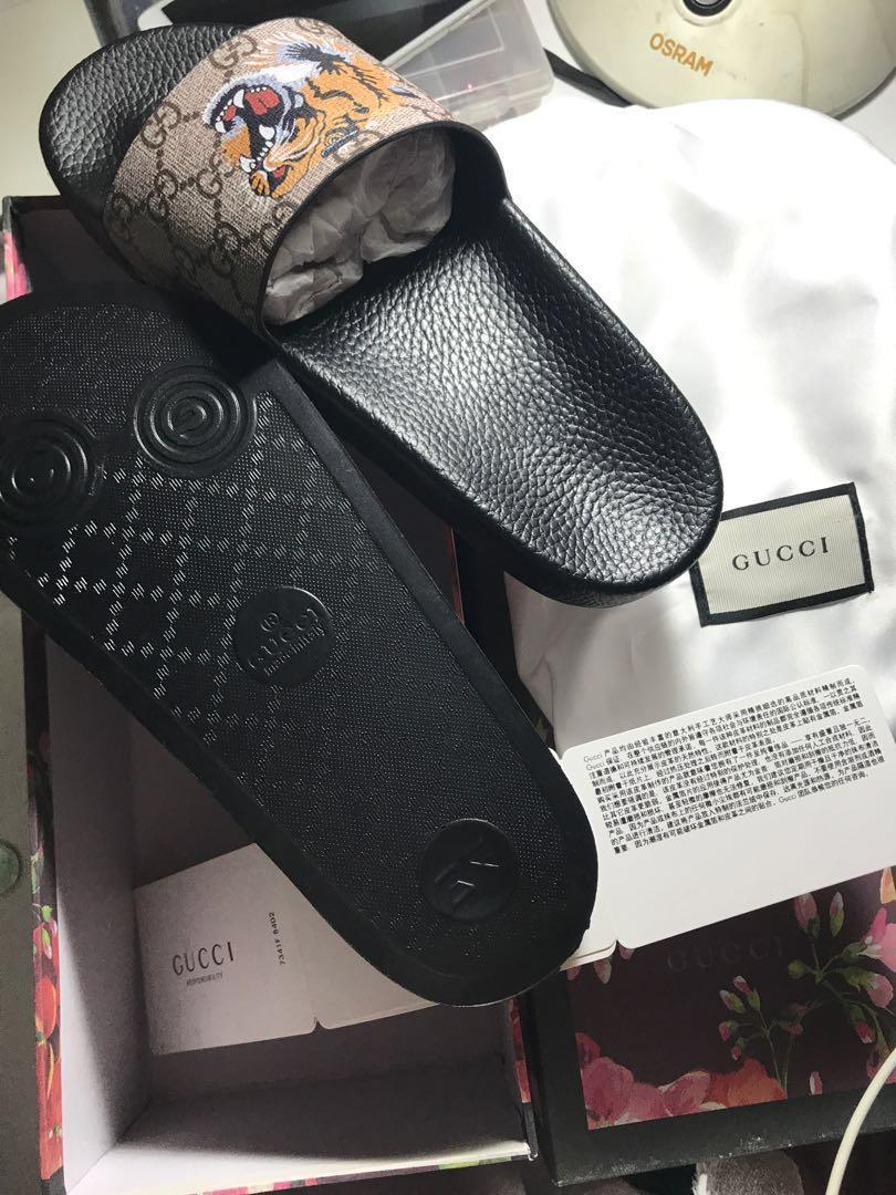 Gucci GG supreme tiger pool slides, Luxury, Shoes on Carousell