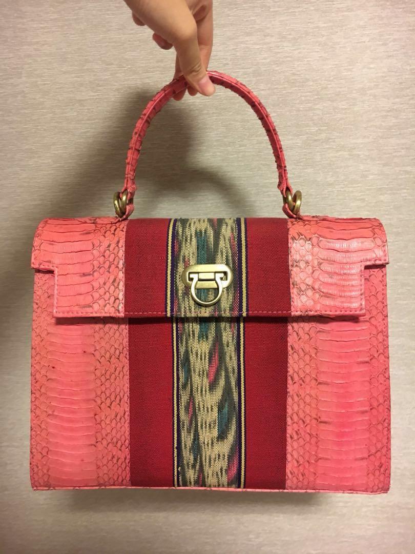 Python skin bag with Indonesian traditional fabric ornament, Luxury ...