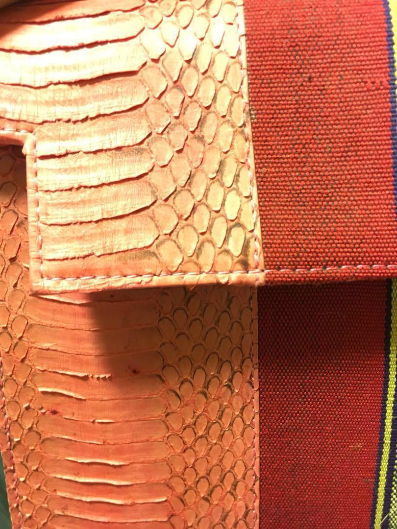 Python skin bag with Indonesian traditional fabric ornament, Luxury ...
