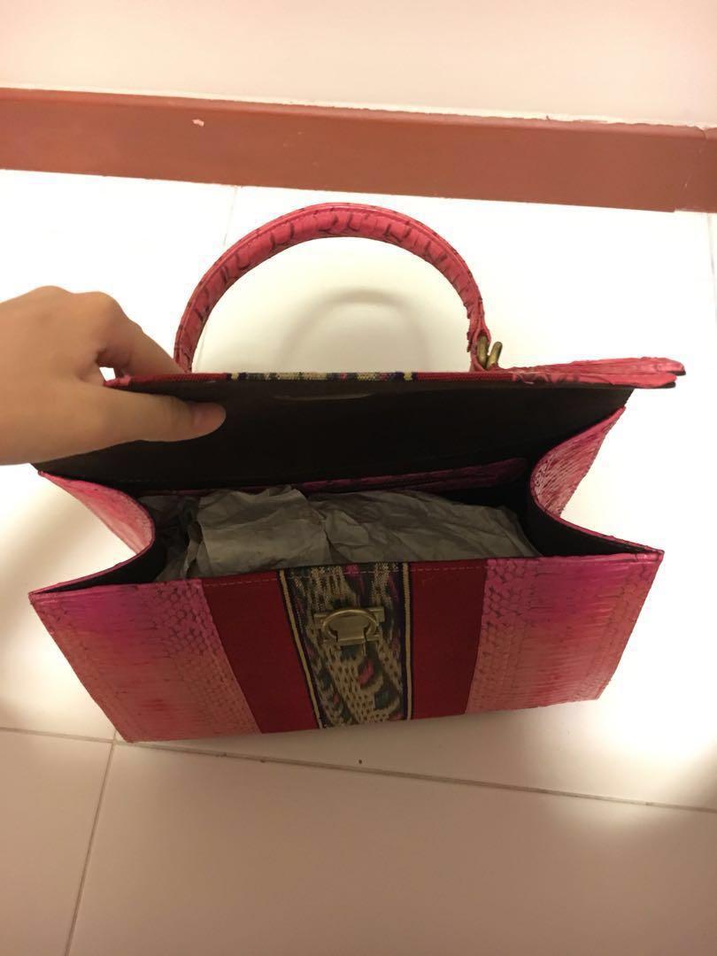 Python skin bag with Indonesian traditional fabric ornament, Luxury ...