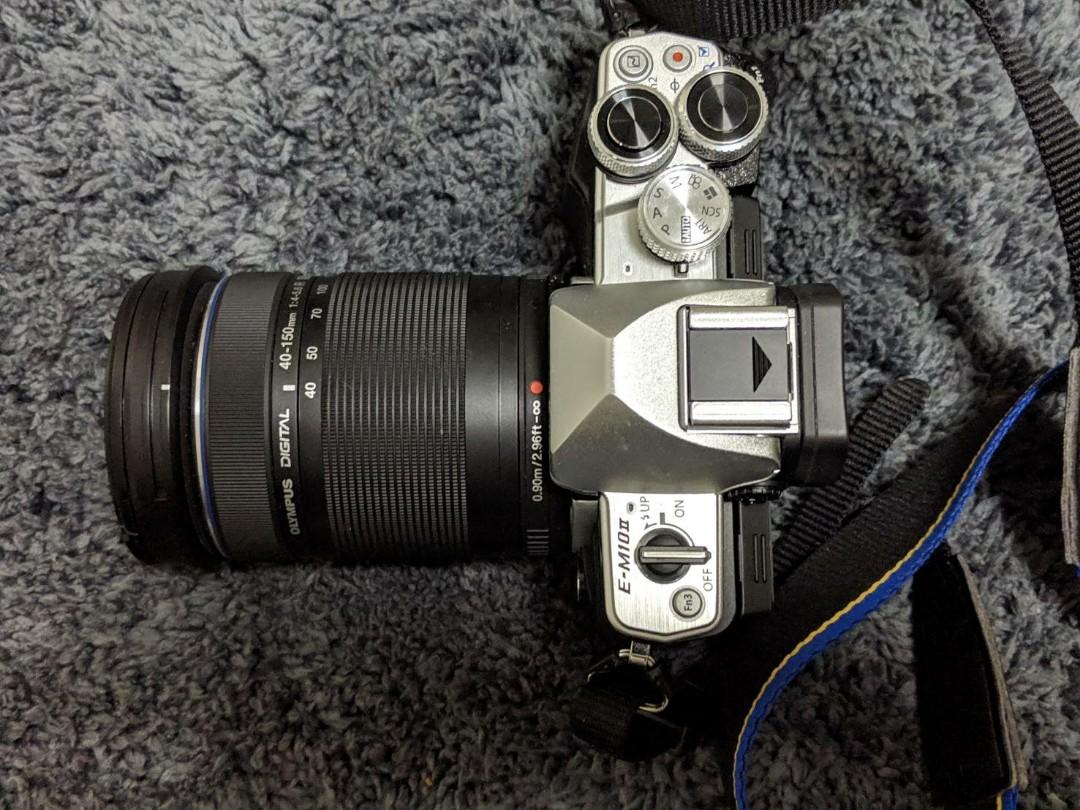 Olympus EM 10 - ii with 2 lenses, 2 batteries, and external flash ...