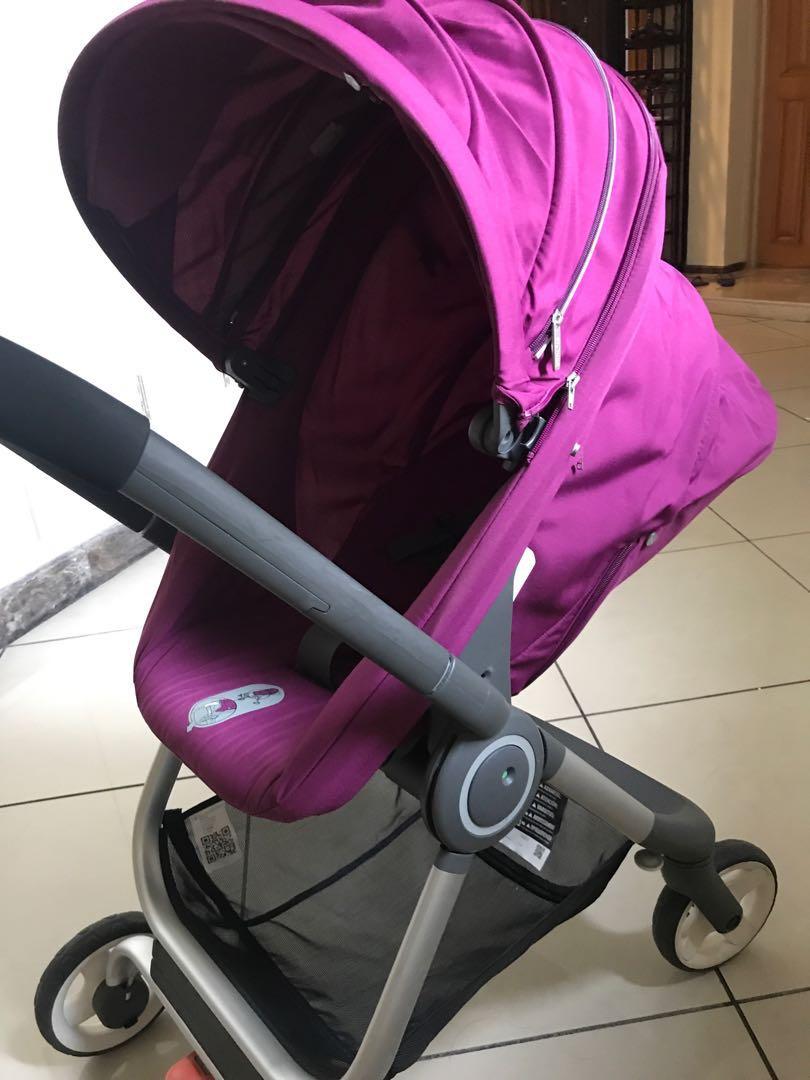 Stokke scoot lightweight stroller with bright purple carrycot and rain ...
