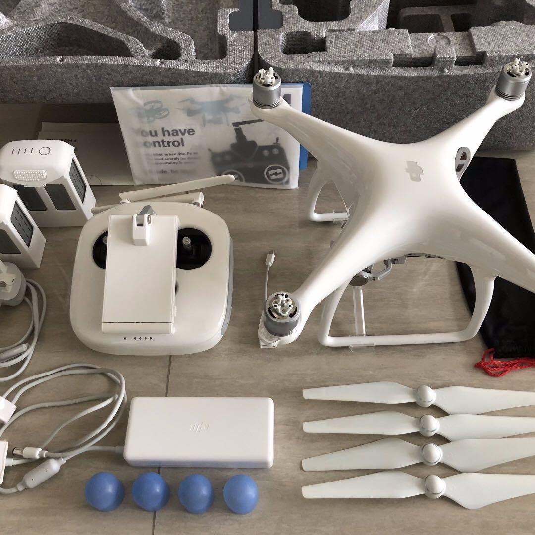 DJI Phantom 4 + Backpack, Photography, Drones on Carousell
