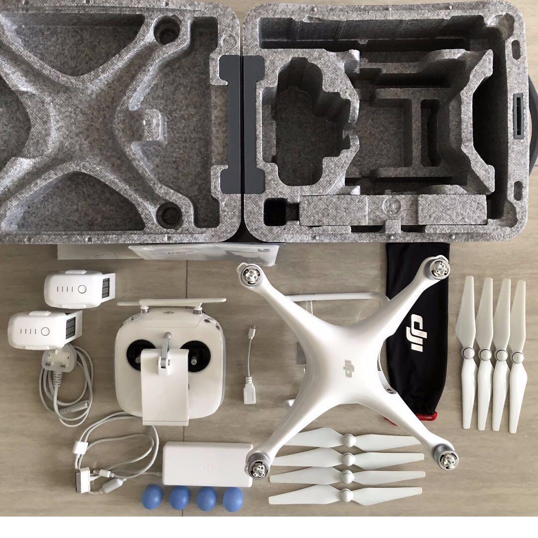 DJI Phantom 4 + Backpack, Photography, Drones on Carousell