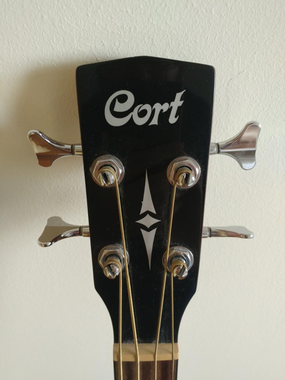 Cort acoustic bass guitar and stand, Hobbies & Toys, Music & Media ...