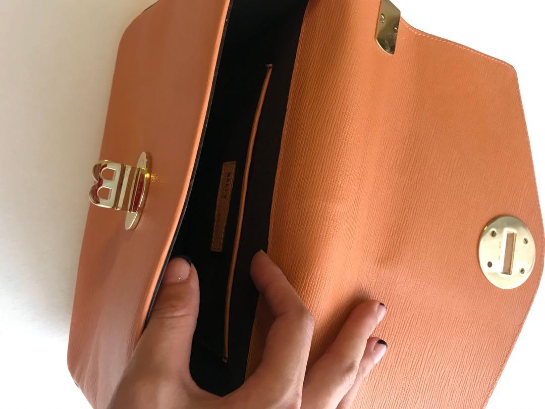 Bally B Turn Lock in Peach, Women's Fashion, Bags & Wallets, Cross-body Bags on Carousell