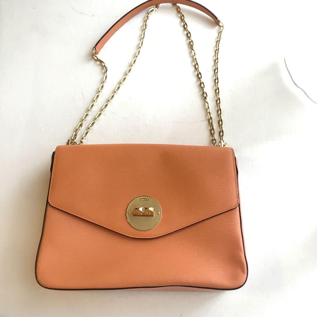 Bally B Turn Lock in Peach, Women's Fashion, Bags & Wallets, Cross-body Bags on Carousell