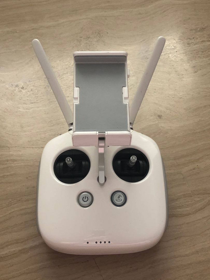 DJI Phantom 4 controller, Photography, Drones on Carousell