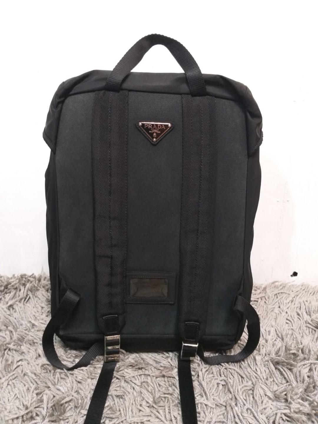 Prada double buckle mens backpack, Men's Fashion, Bags, Backpacks on ...