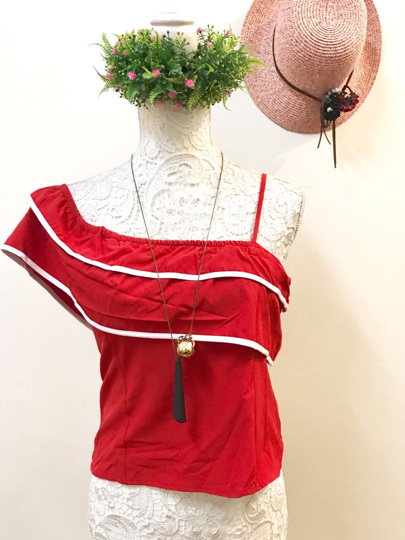 Venus cut red blouse on Carousell