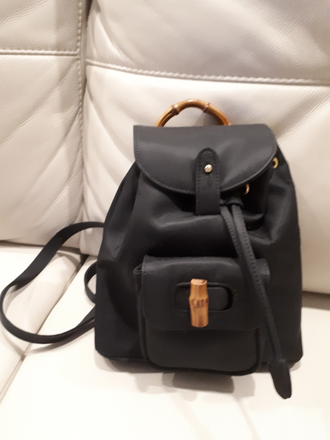 Backpack with bamboo handle, Luxury, Bags & Wallets on Carousell
