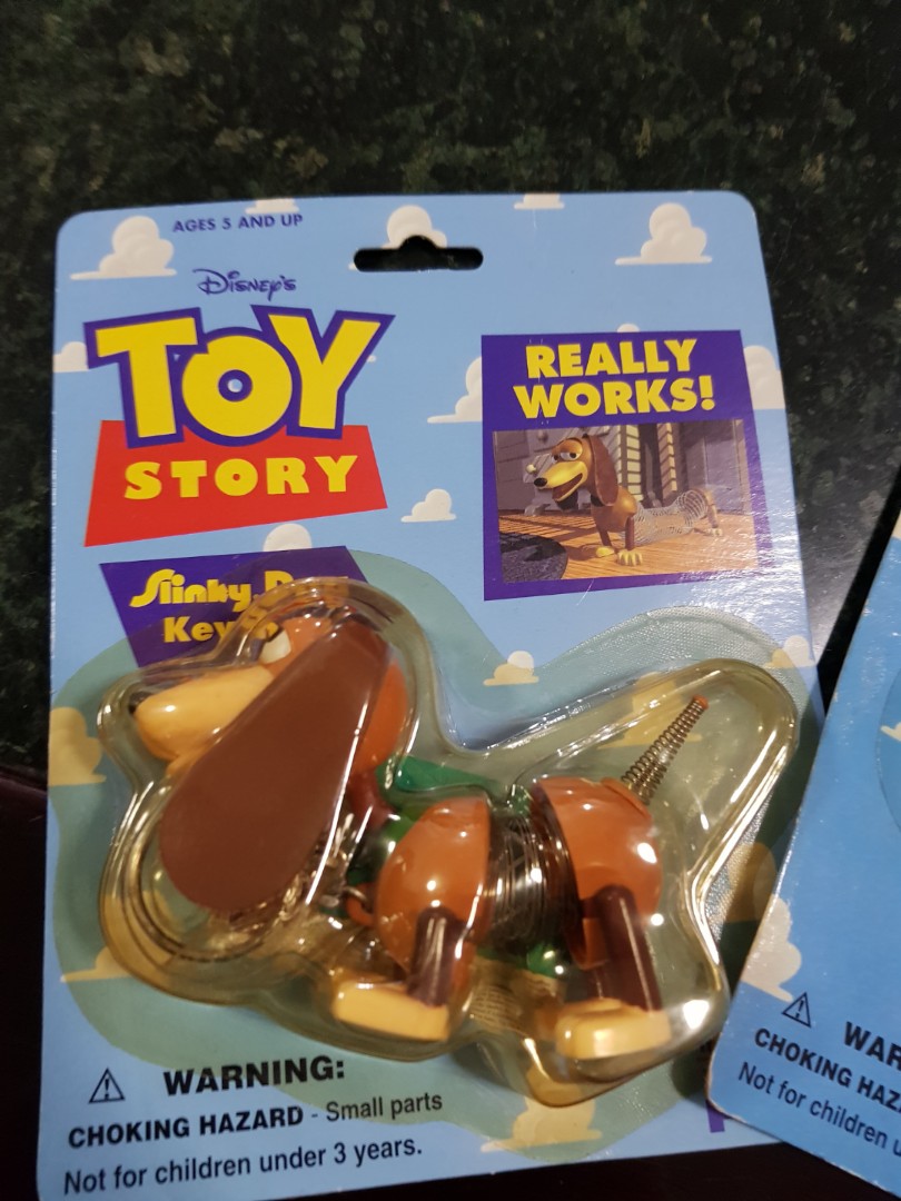 Toy Story Slinky Dog key chain, Hobbies & Toys, Toys & Games on Carousell