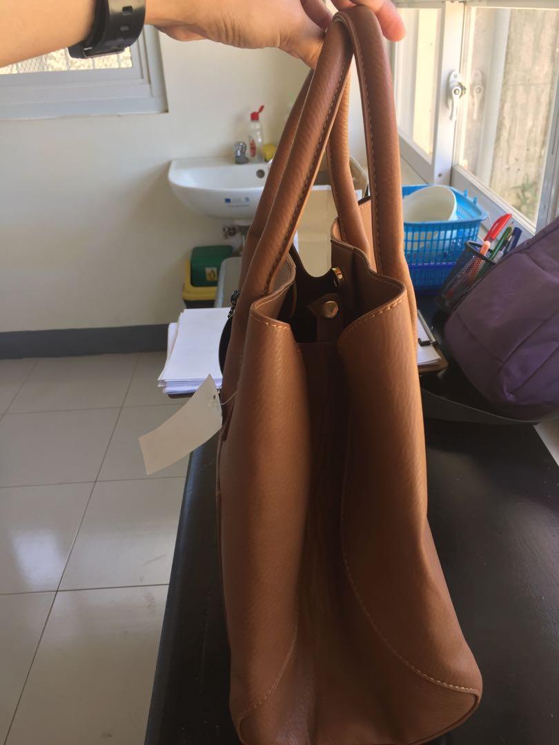 Imo bag, Women's Fashion, Bags & Wallets, Cross-body Bags on Carousell