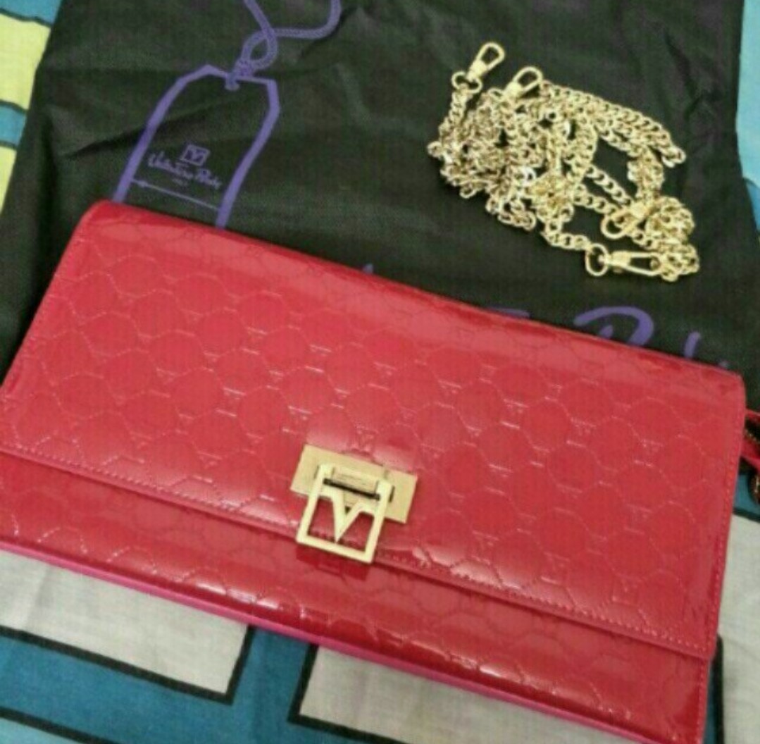 Valentino Rudy pink clutch, Luxury, Bags & Wallets on Carousell