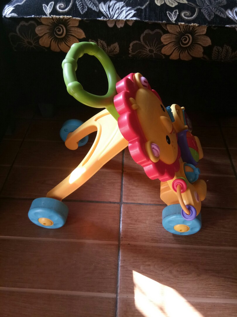 Fisher Price musical lion walker, Bayi & Anak, Mainan & Baby Walker di ...